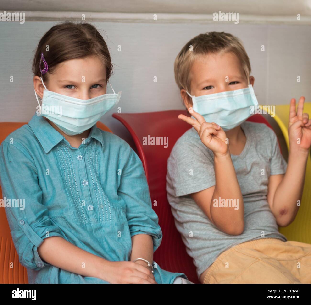 Kids wearing facial disposable mask to avoid viral infection. Virus ...