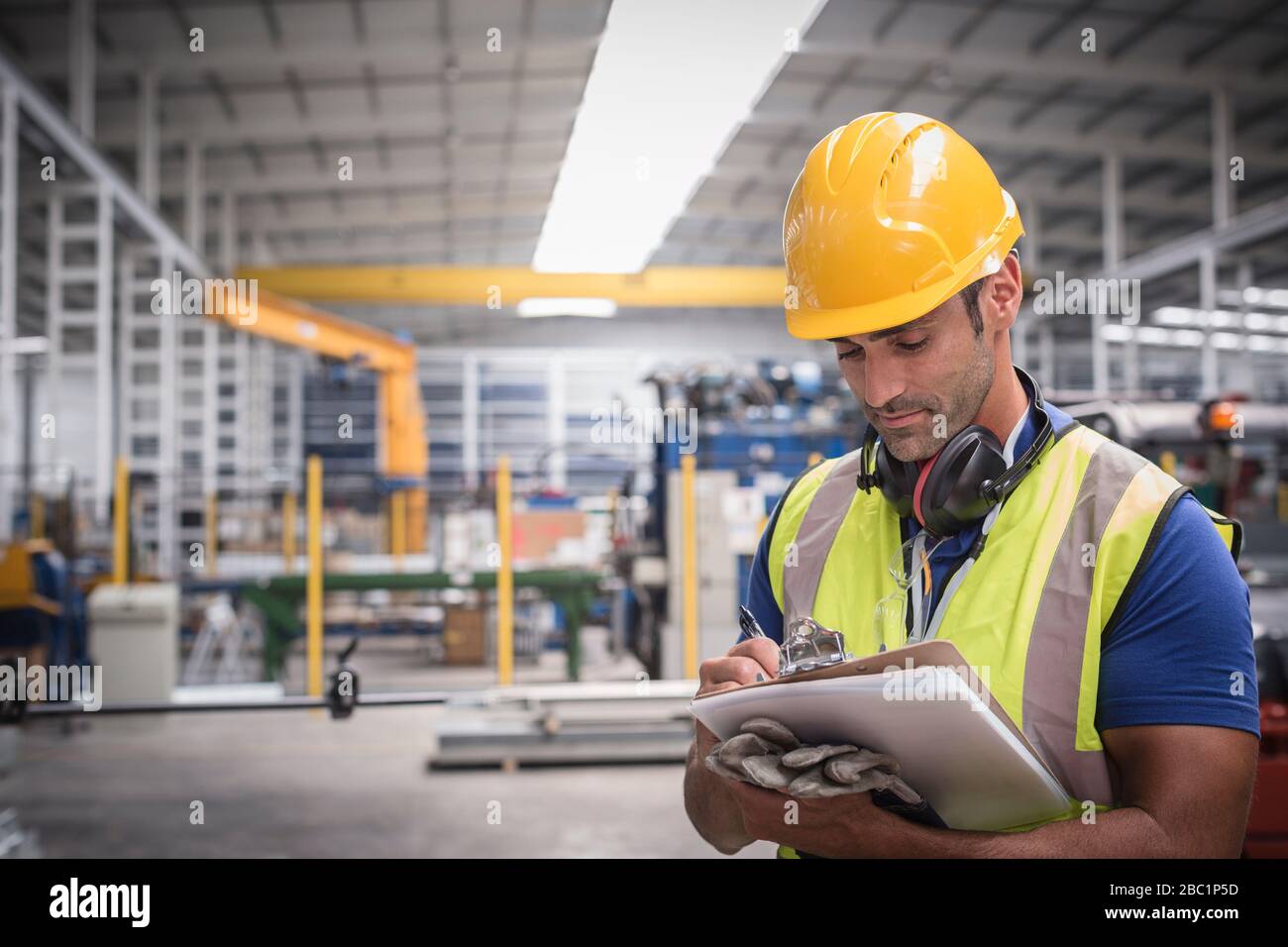 Worker writing hi-res stock photography and images - Alamy