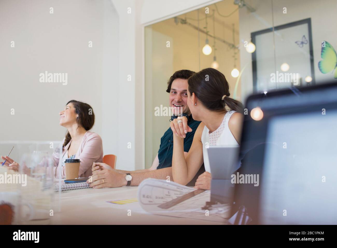 Architects talking in conference room meeting Stock Photo - Alamy