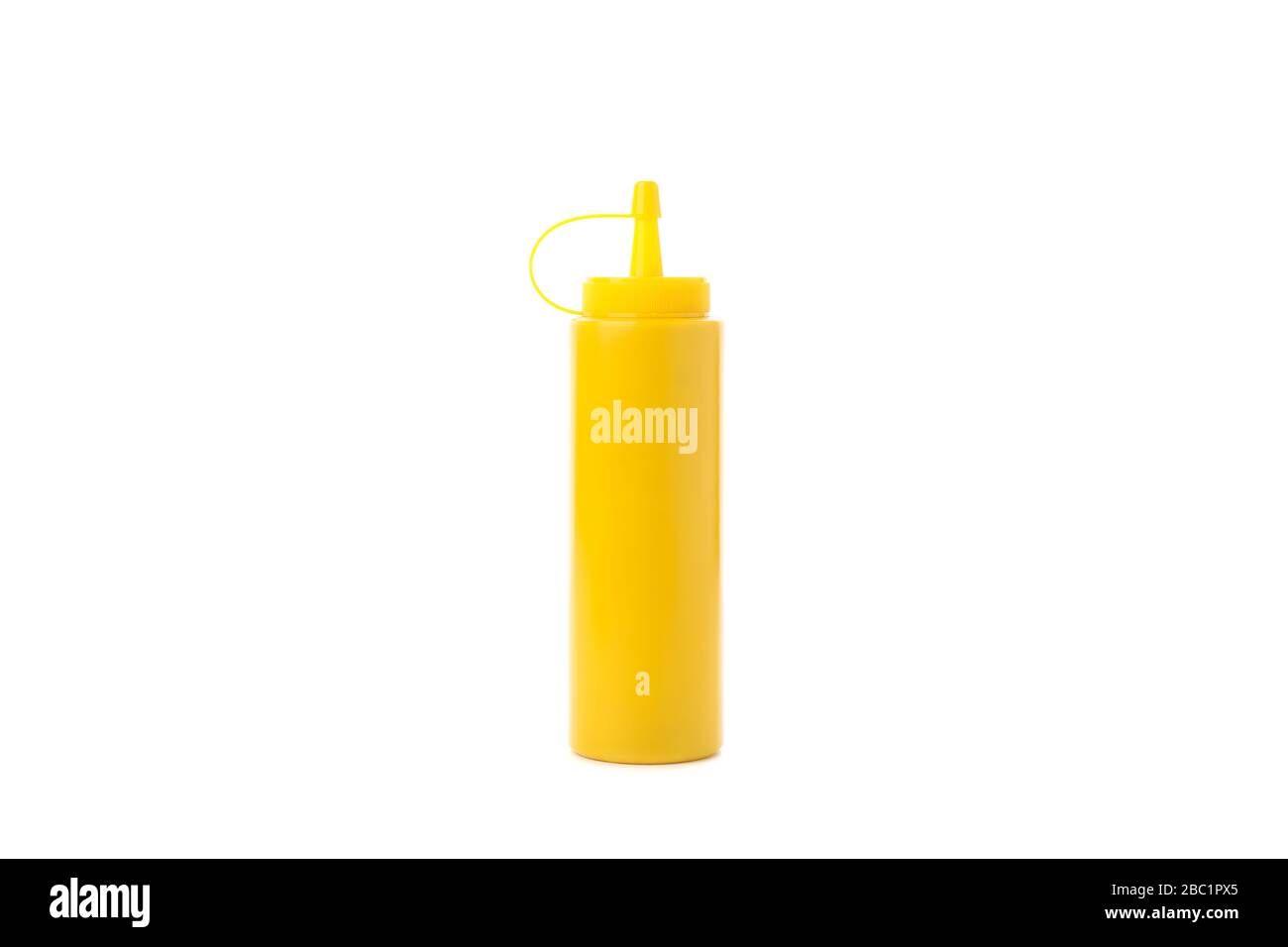 Yellow mustard bottle isolated on white background Stock Photo - Alamy