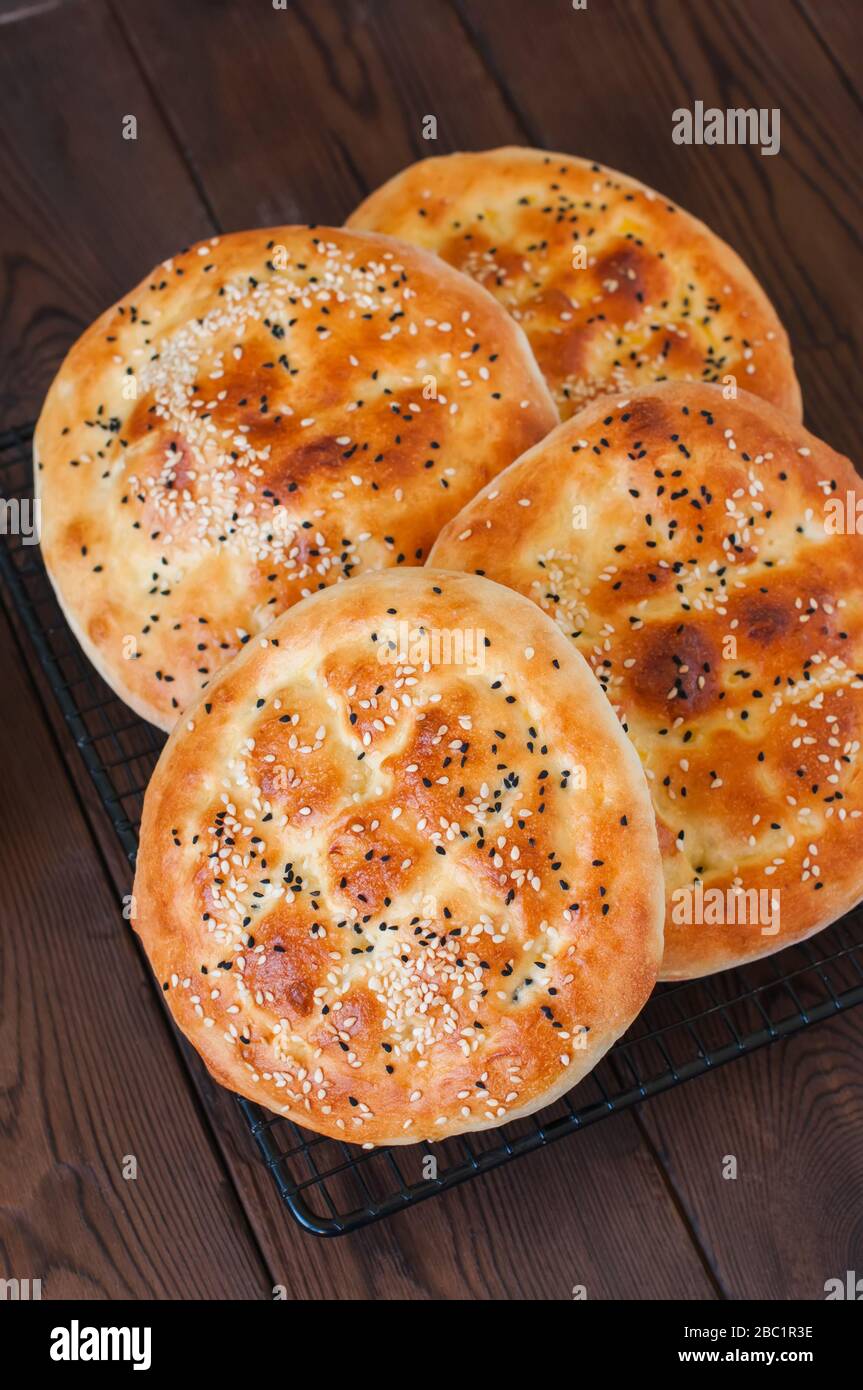 Ramadan pidesi Traditional turkish flatbread with nigella or sesame ...