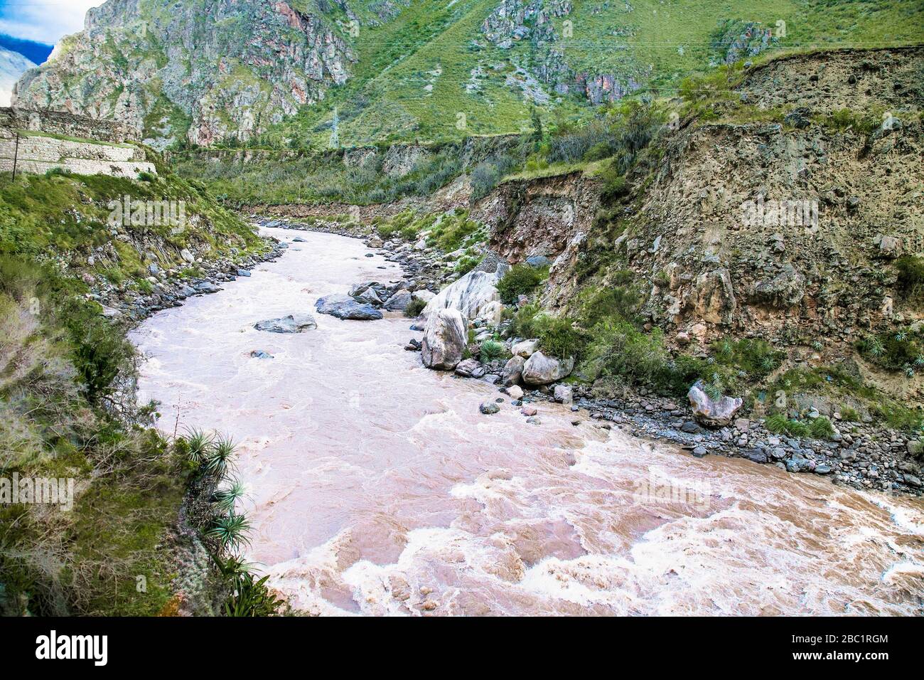 Urubamba river rapids and Machu Picchu Pueblo in the back, sacred ...