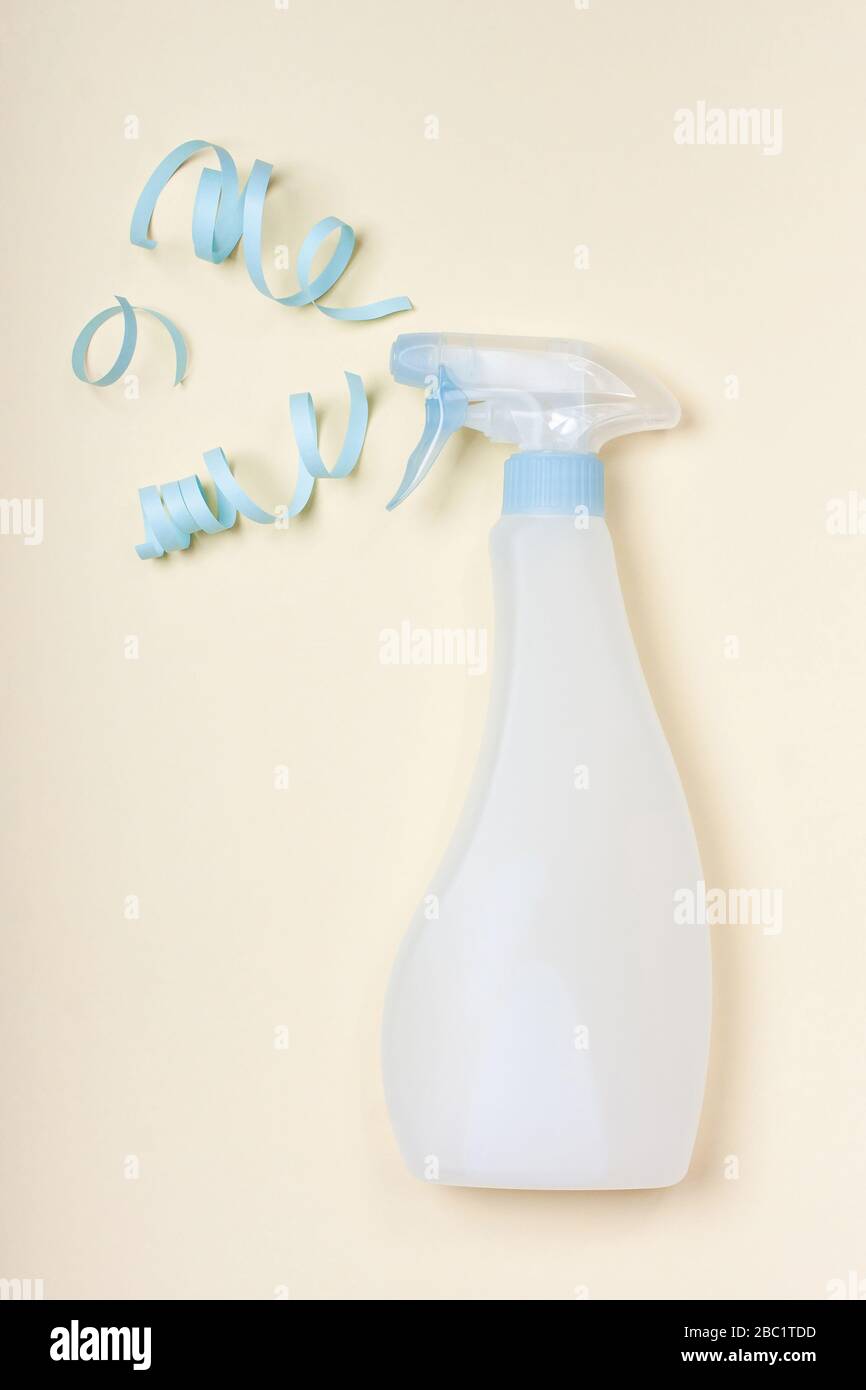 Disinfectant spray on the yellow background. The concept of antiseptics ...