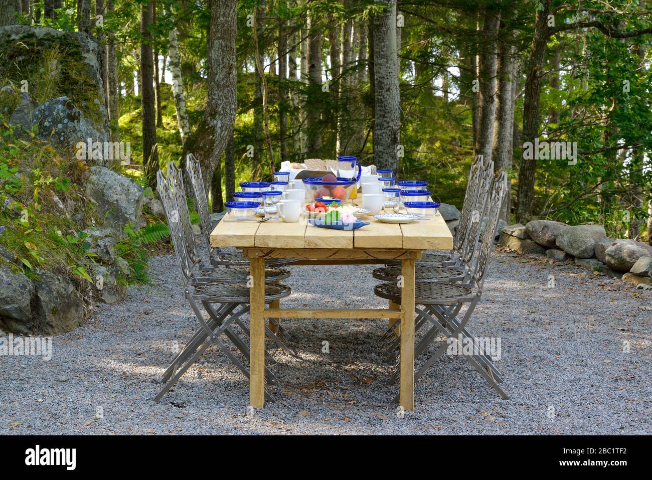 A cleared table, breakfast outside, Finspång, Östergötland, Sweden ...