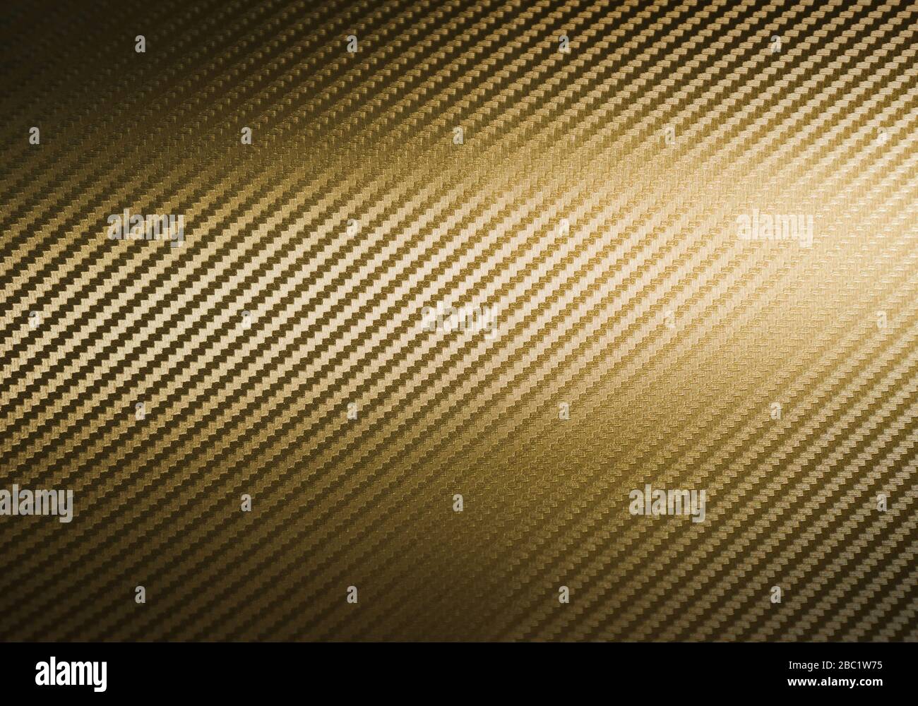 Gold carbon fiber texture Stock Photo - Alamy