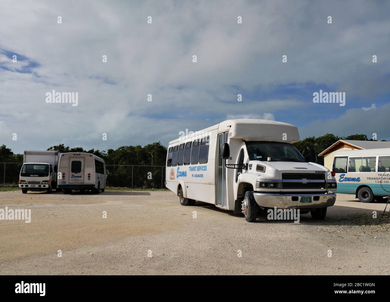 George Town, Bahamas- January 2018: TOur buses and vans parked near the ...