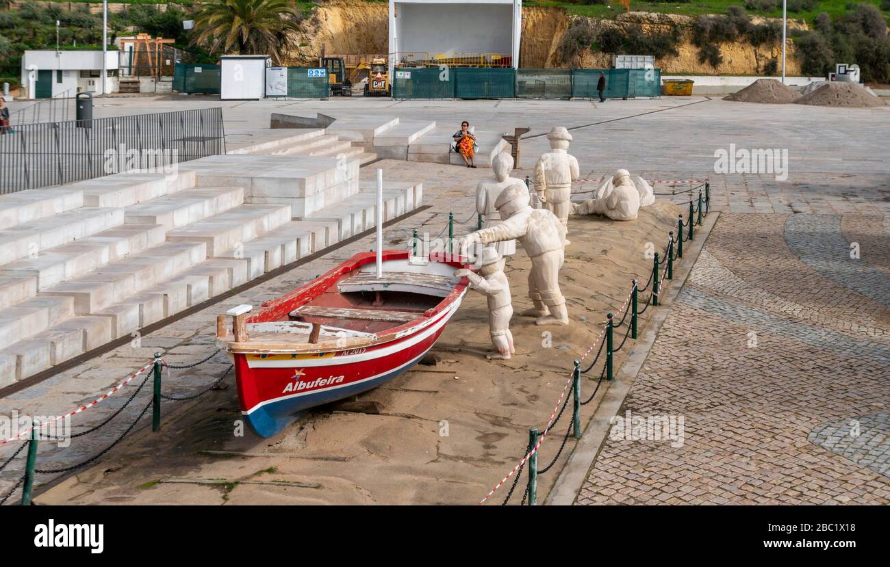 Stone statues of fishermen in Albufeira, Algarve, Portugal Stock Photo ...