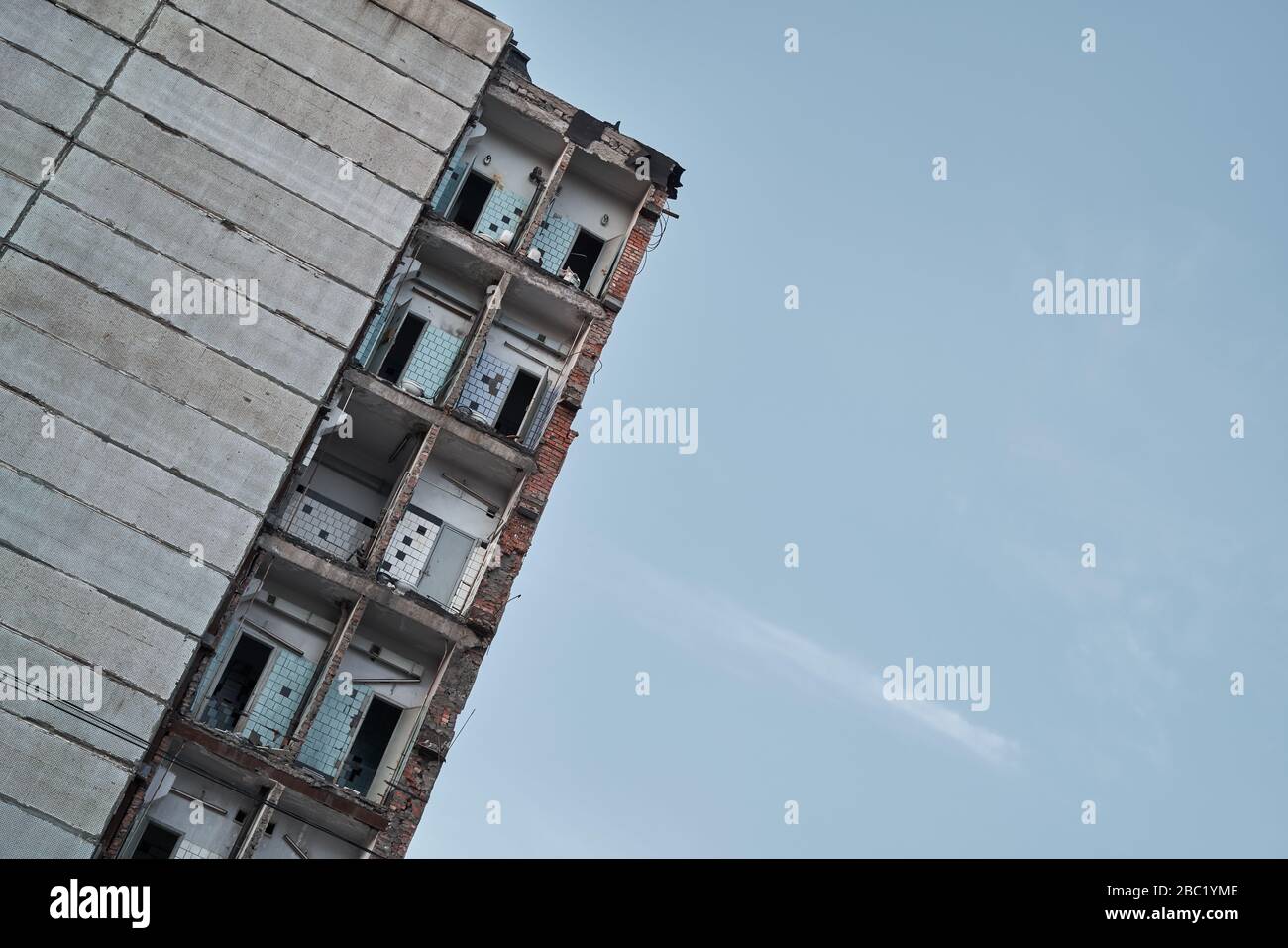 Apocalyptic picture. Old ruined building is falling down. Urban decay ...
