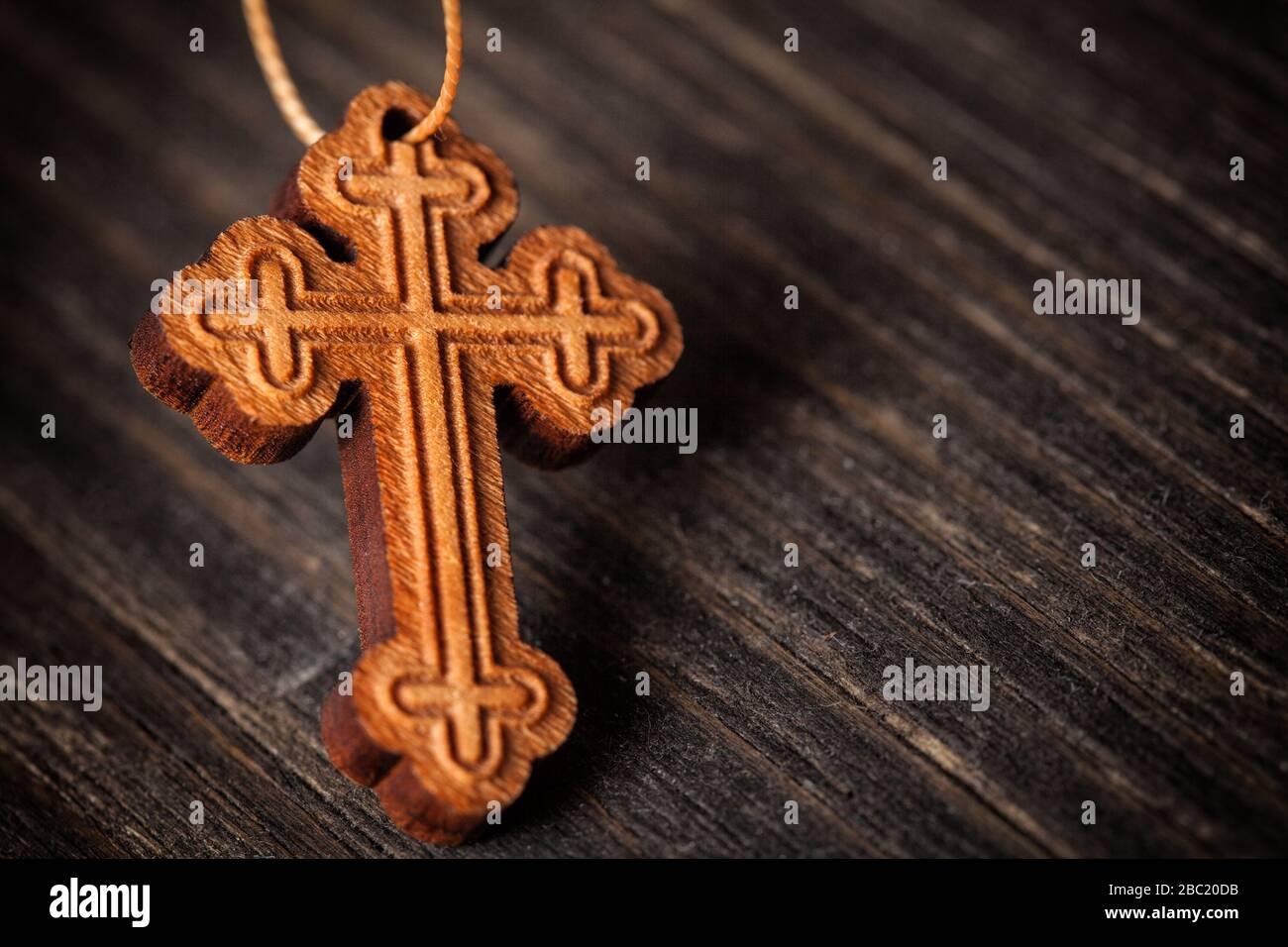 Closeup picture of small wooden christian cross Stock Photo - Alamy