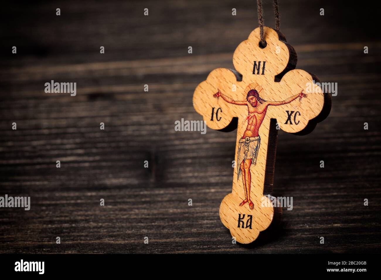 Closeup picture of small wooden christian cross Stock Photo - Alamy