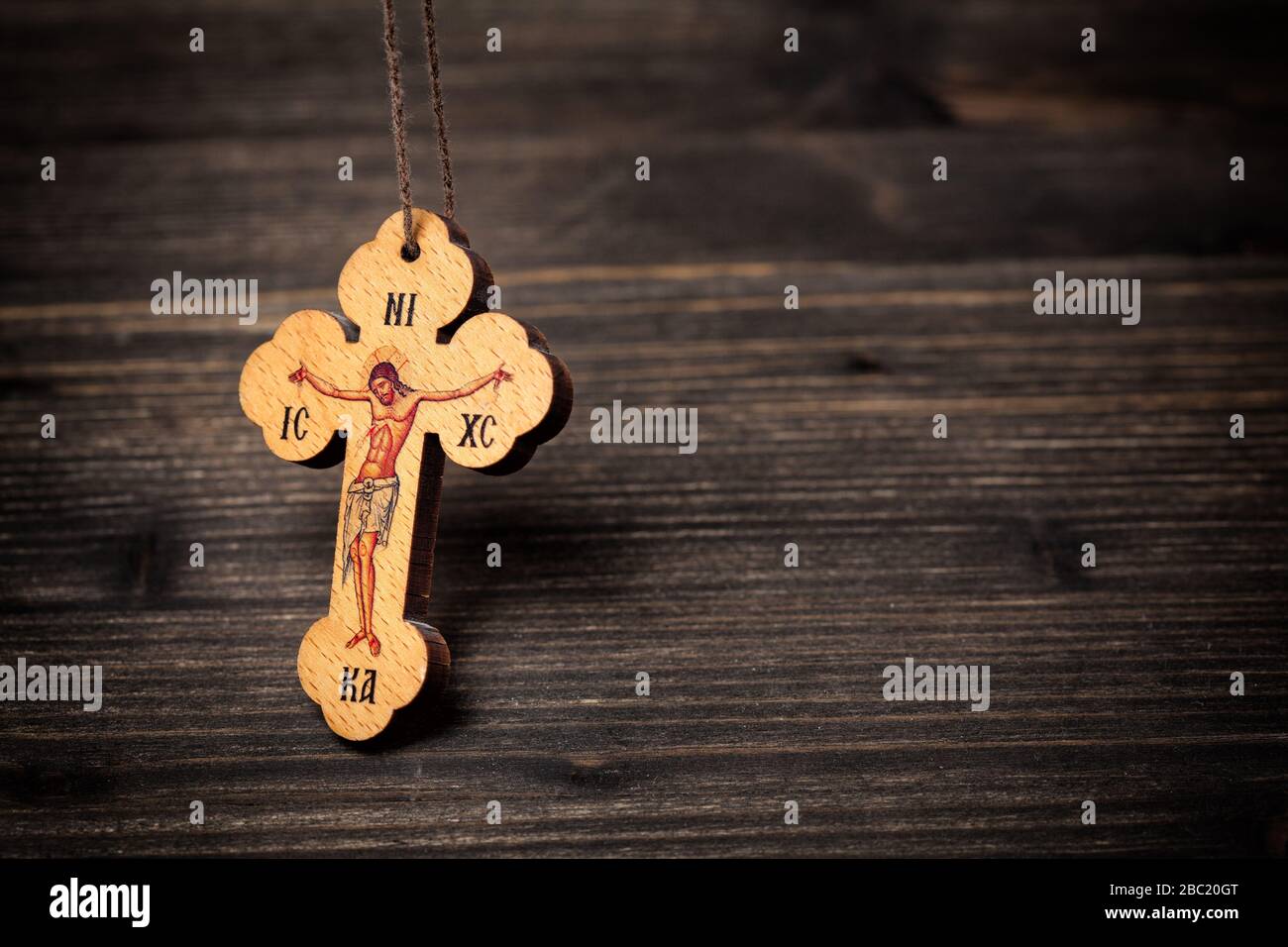 Closeup picture of small wooden christian cross Stock Photo - Alamy