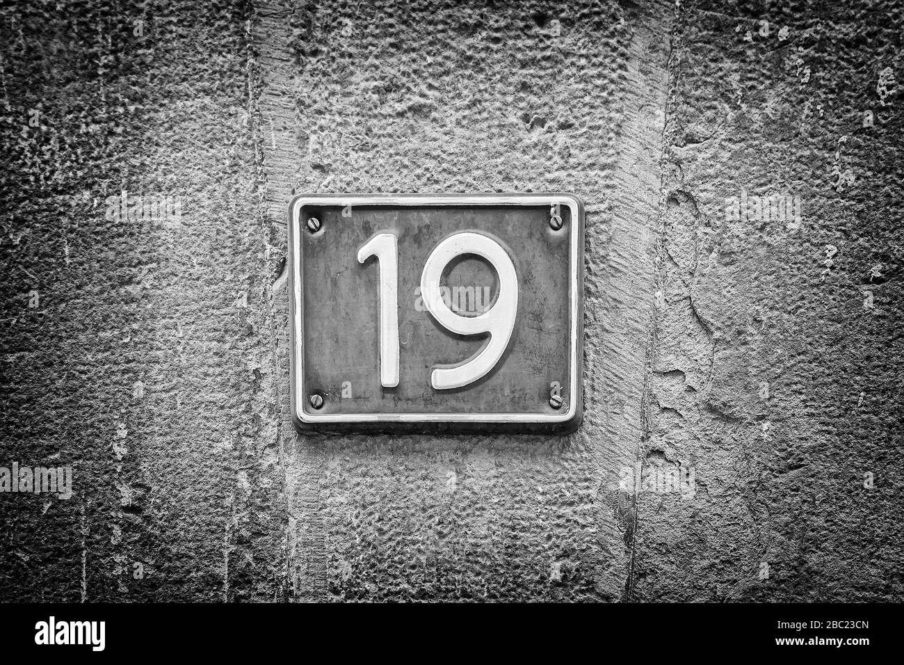 Number nineteen, detail of a metal plate with the number deiecinueve ...