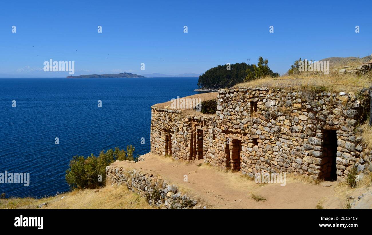 Inca Temple of the Sun on the Island of the Sun and view of the Andes ...