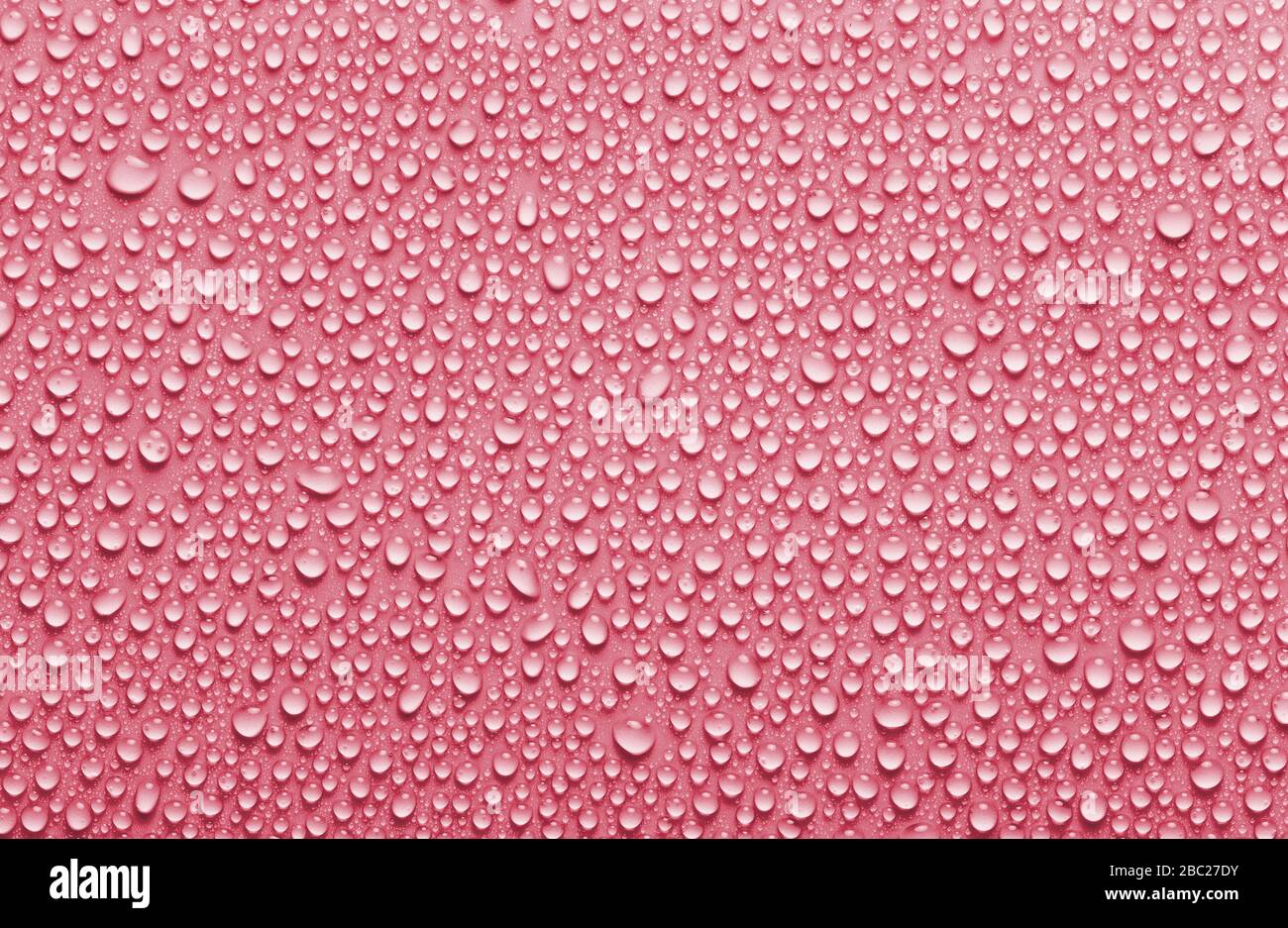 Rain droplets background, red colored water drops texture Stock Photo ...