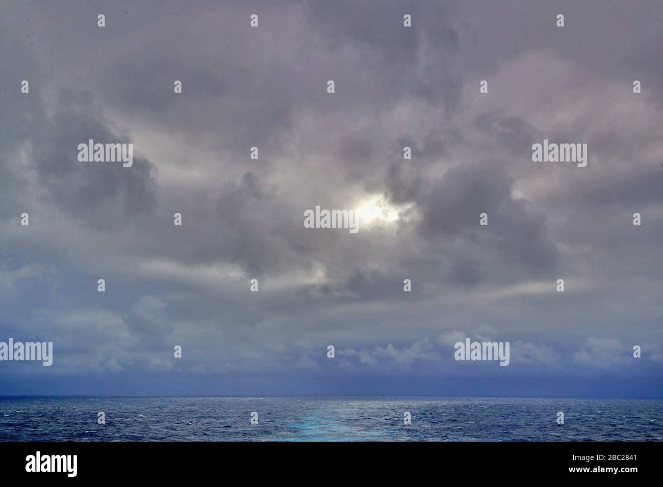 omnious sky over ocean Stock Photo - Alamy