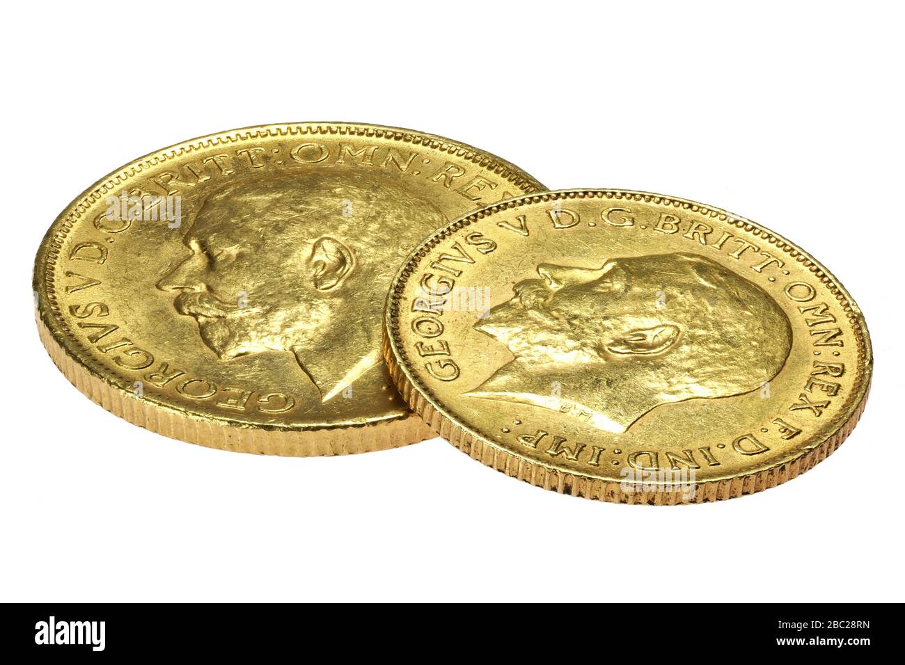 British full and half Sovereign gold coins (George V) isolated on white ...
