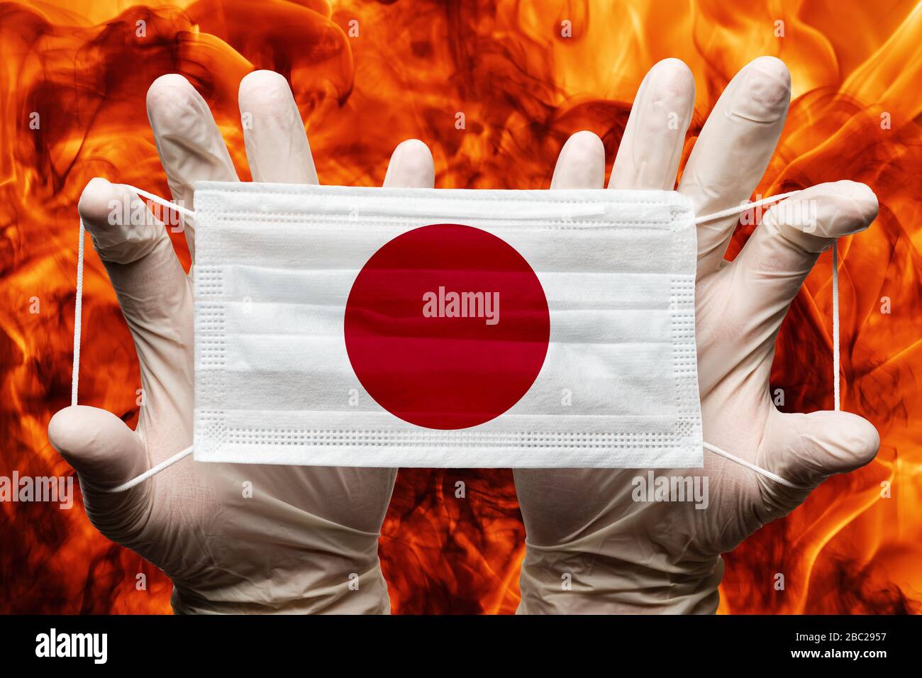 Doctor holding in white gloves protection medical face mask ...