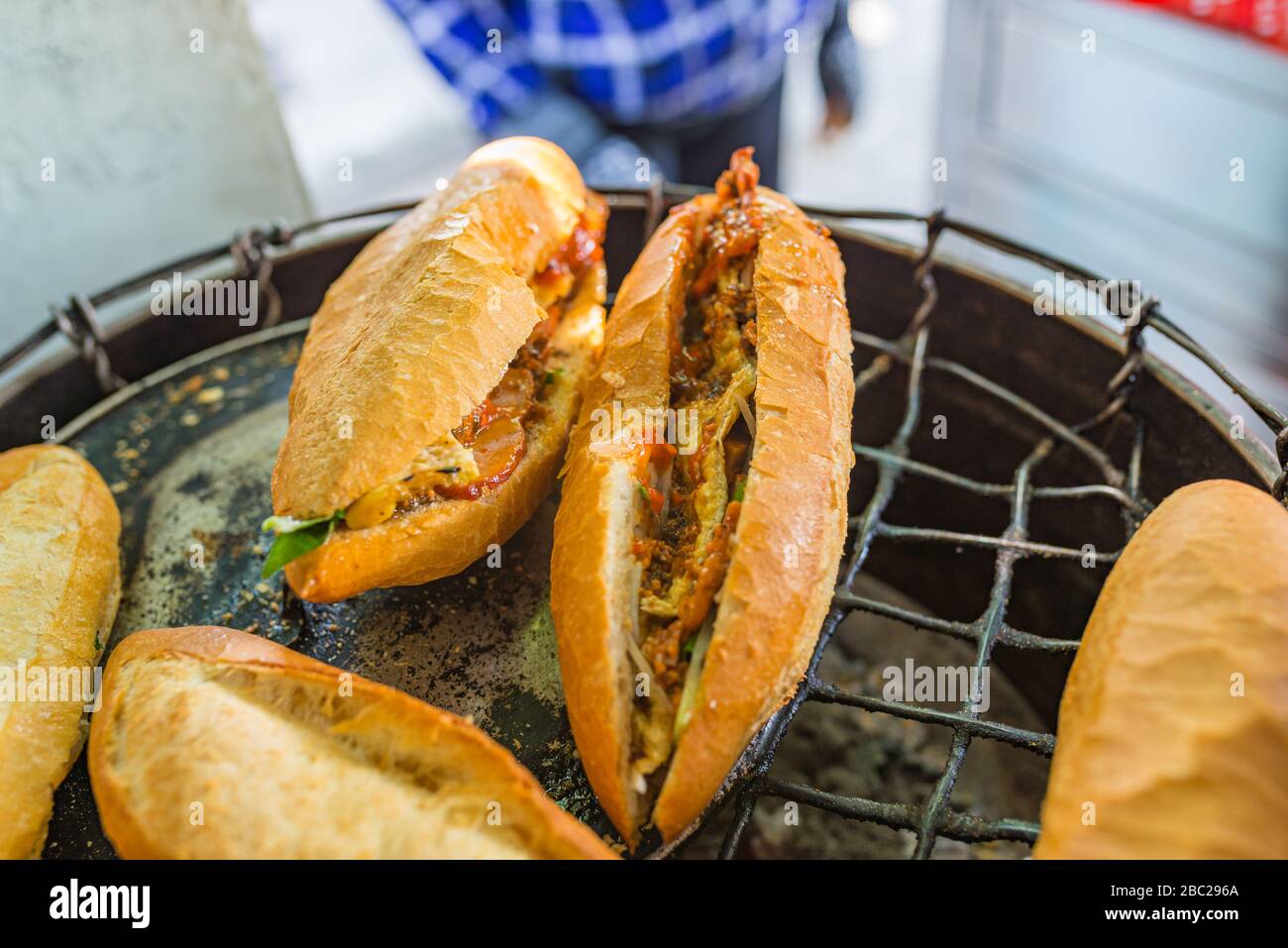 Vietnamese famous local street food- Banh Mi, crispy pork sandwich ...