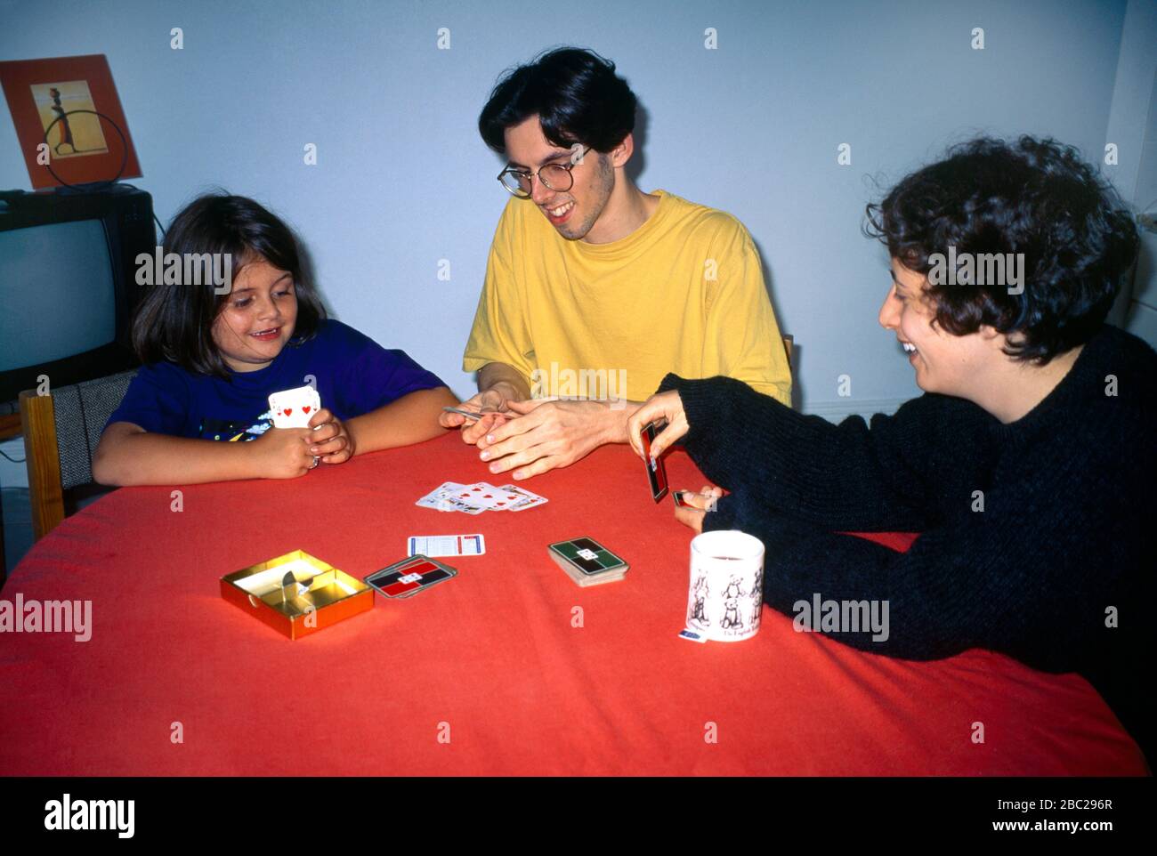 Family Playing Card Game Snap Surrey England Stock Photo - Alamy