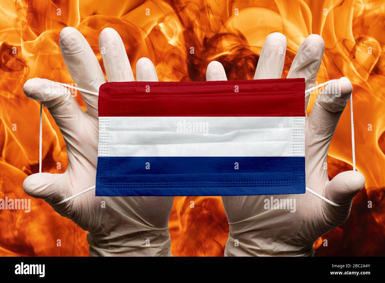 Doctor holding in white gloves protection medical face mask ...