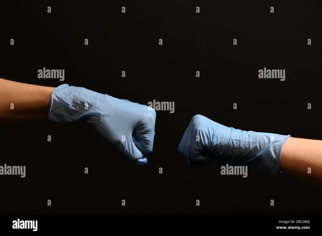 Fist bumps, high-fives spread fewer germs than handshakes Stock Photo ...