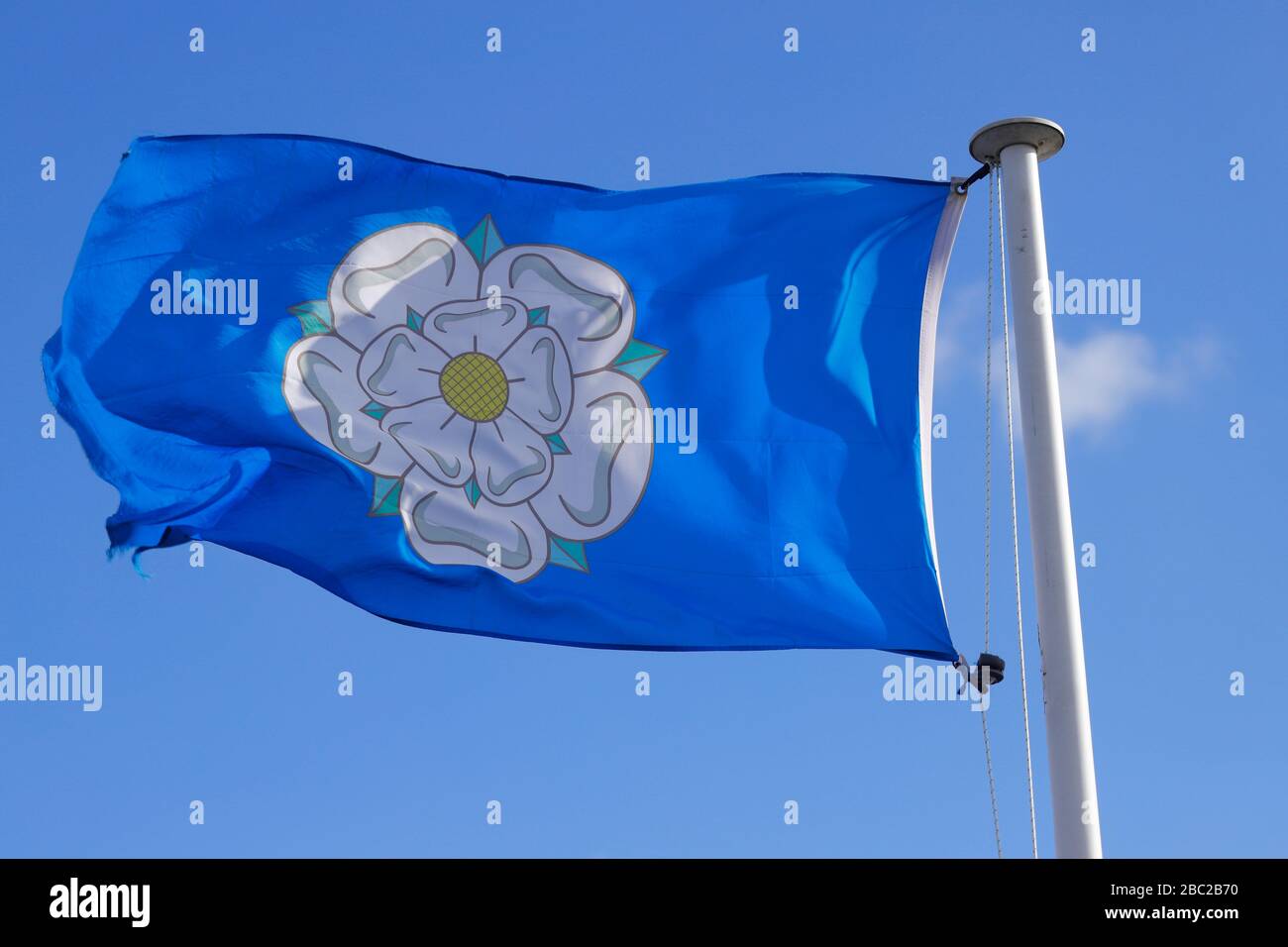 The iconic Yorkshire Flag blowing in the wind of Gods Own County Stock ...