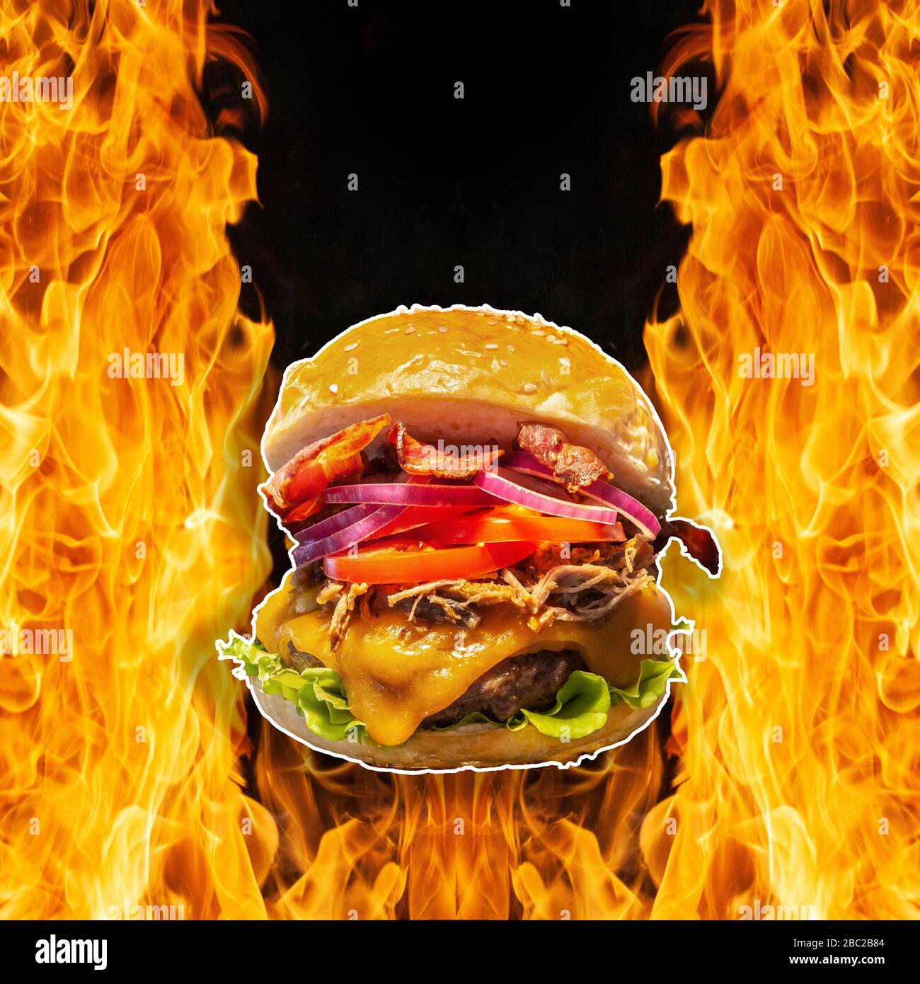 Close-up of home made burgers with fire flames Stock Photo - Alamy