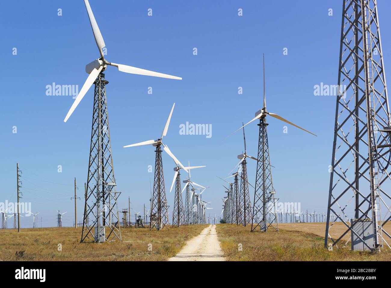 Huge blades of a wind generator on a high mast in the Crimean steppe ...