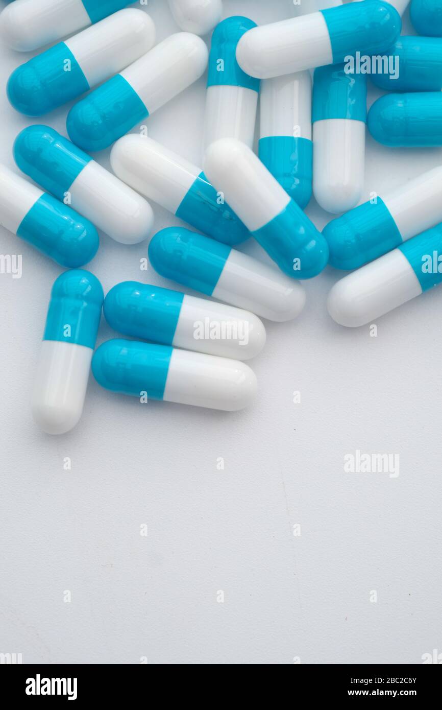 Capsules pill spilled out hi-res stock photography and images - Alamy