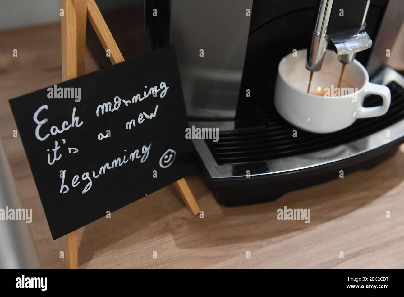 Espresso coffee and a morning message Stock Photo - Alamy