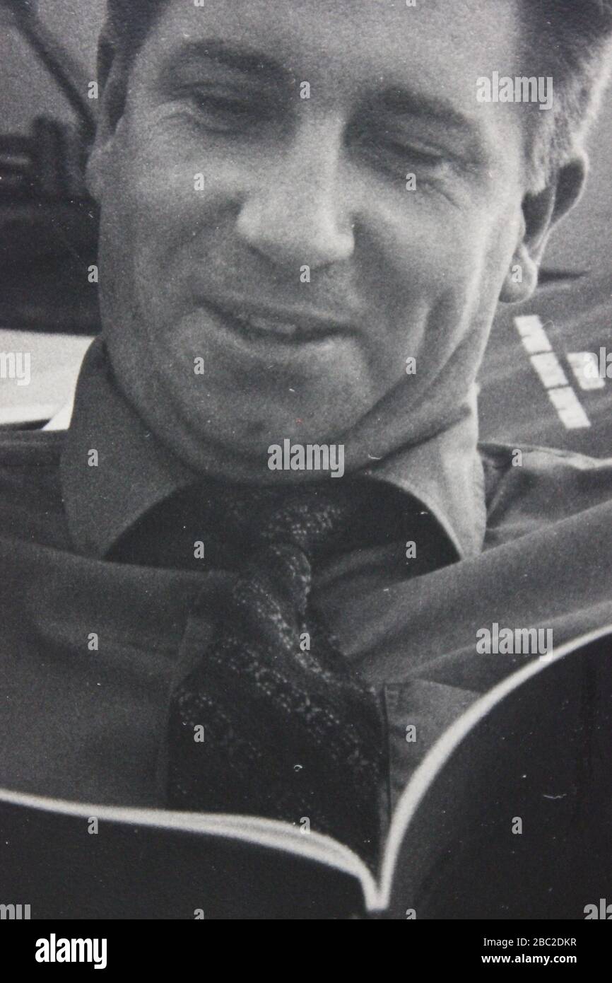 A very happy man reading a journal magazine Stock Photo - Alamy