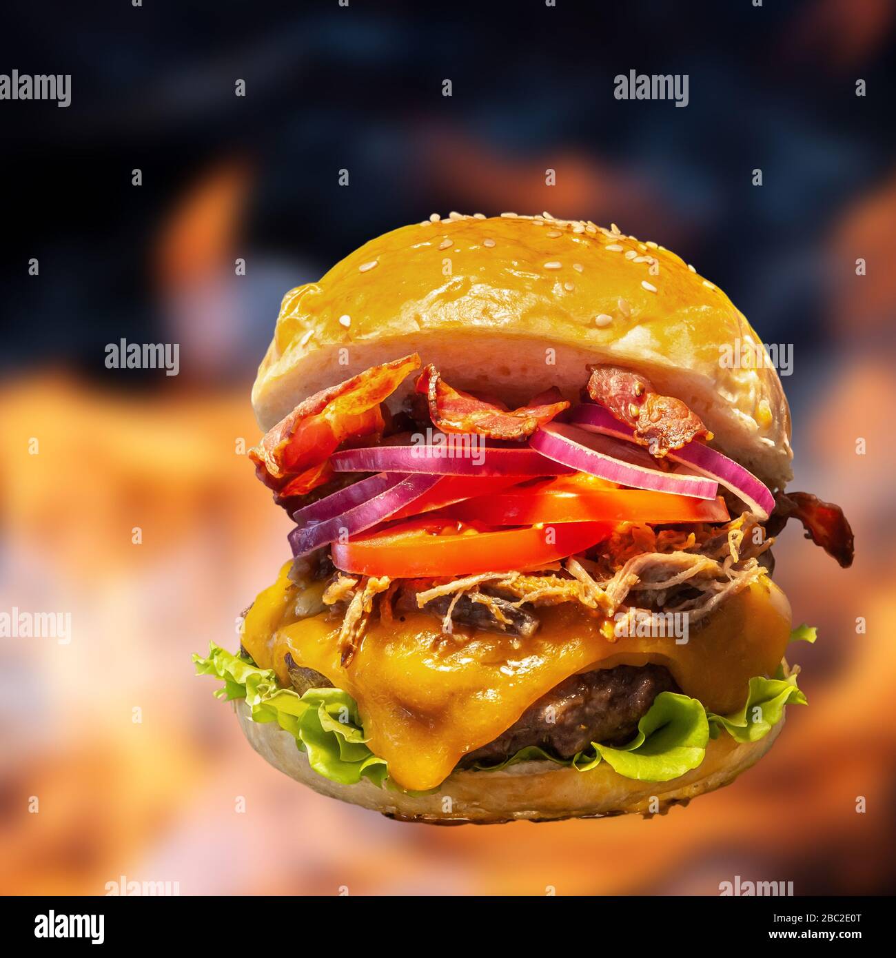 Hamburger fire flame cheeseburger hi-res stock photography and images ...