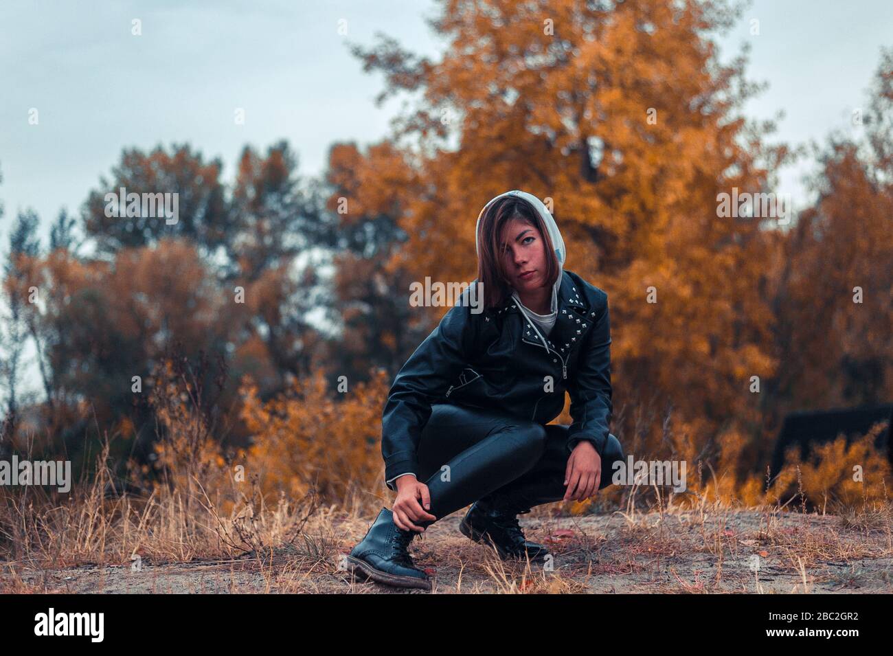 Teen model and boots hi-res stock photography and images - Alamy