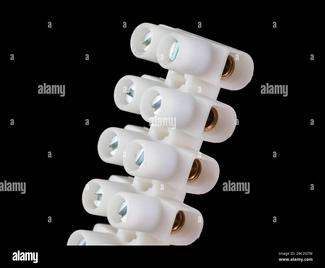 Electric connection strip with screws for cable splicing isolated on a ...