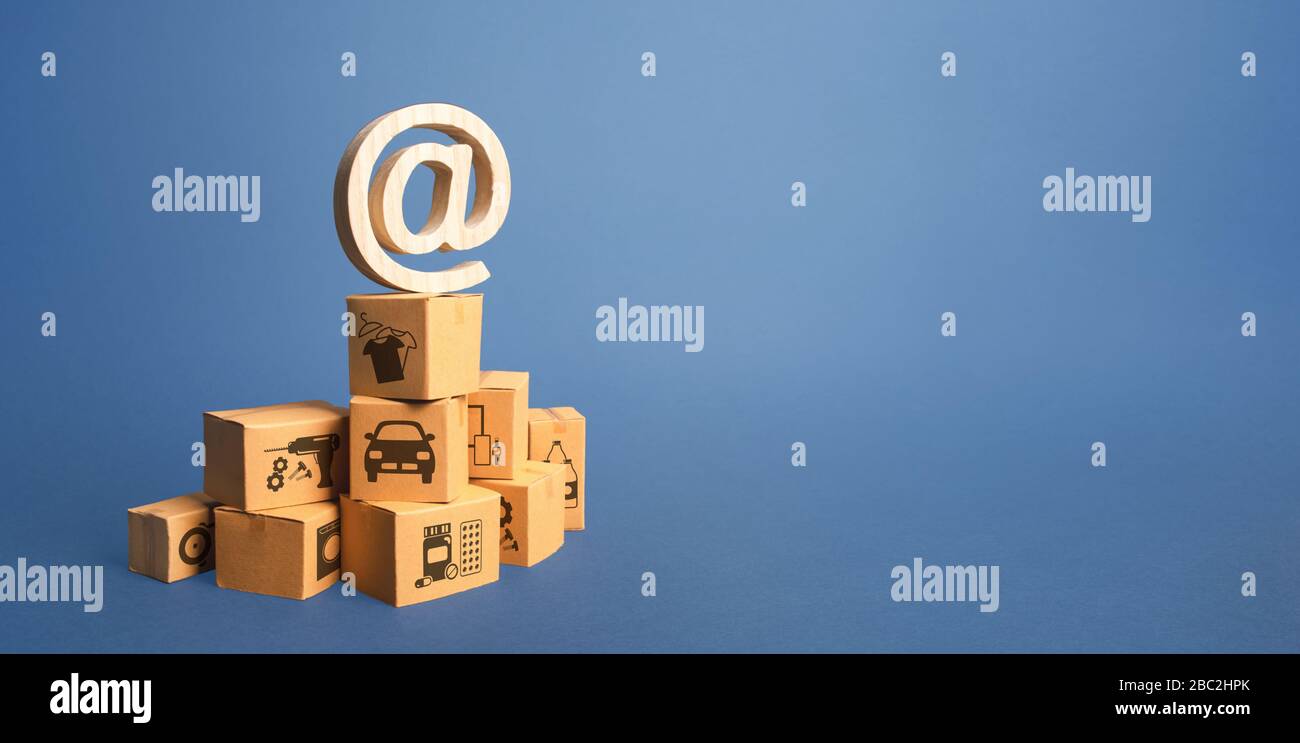 Stack of boxes and email internet symbol. Online Internet distribution ...