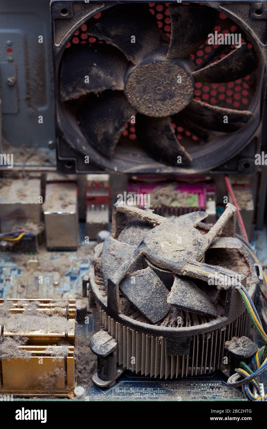 View inside the personal computer. Lot of dust on the motherboard ...