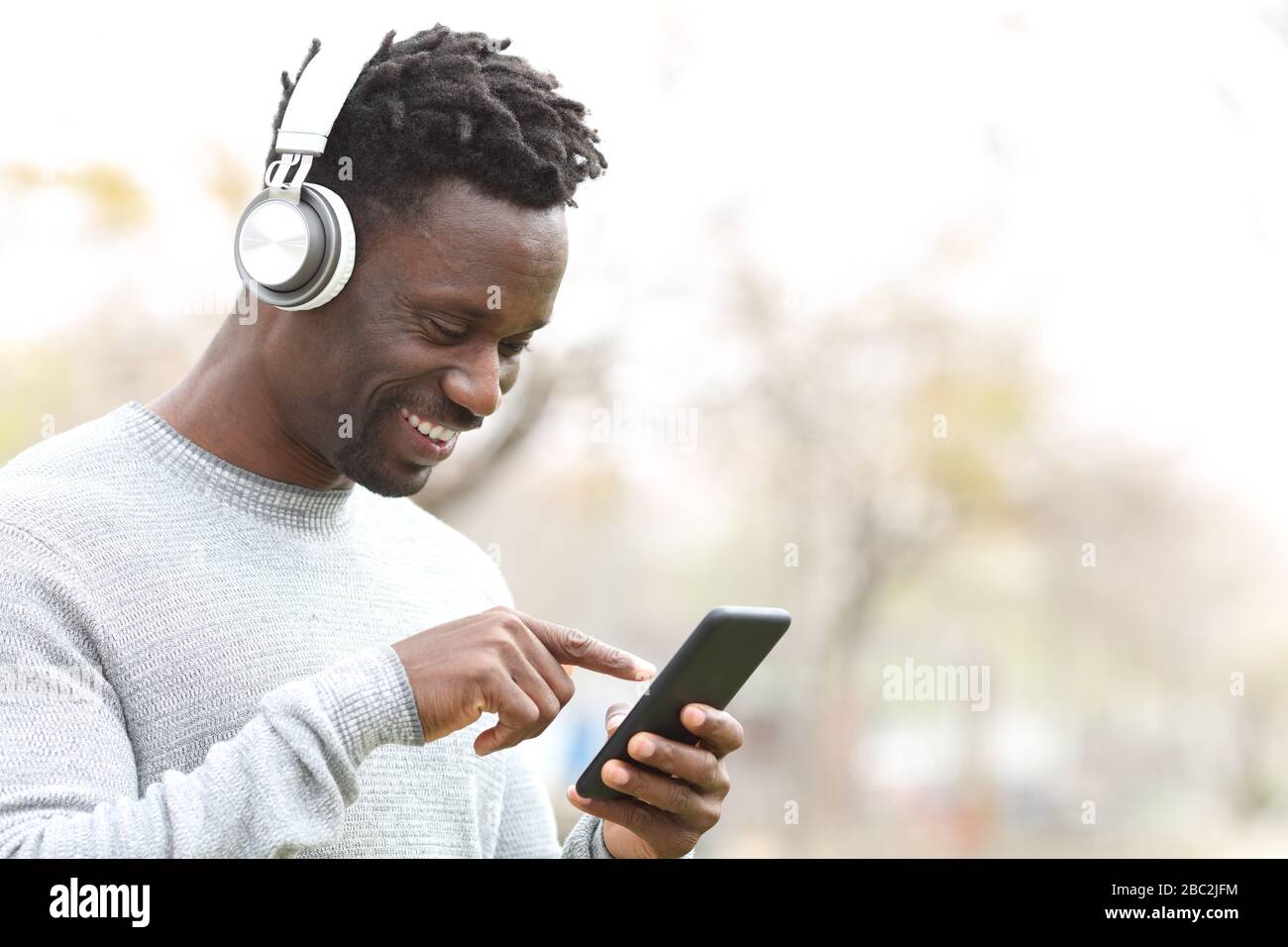 People Listening To Music With Headphones