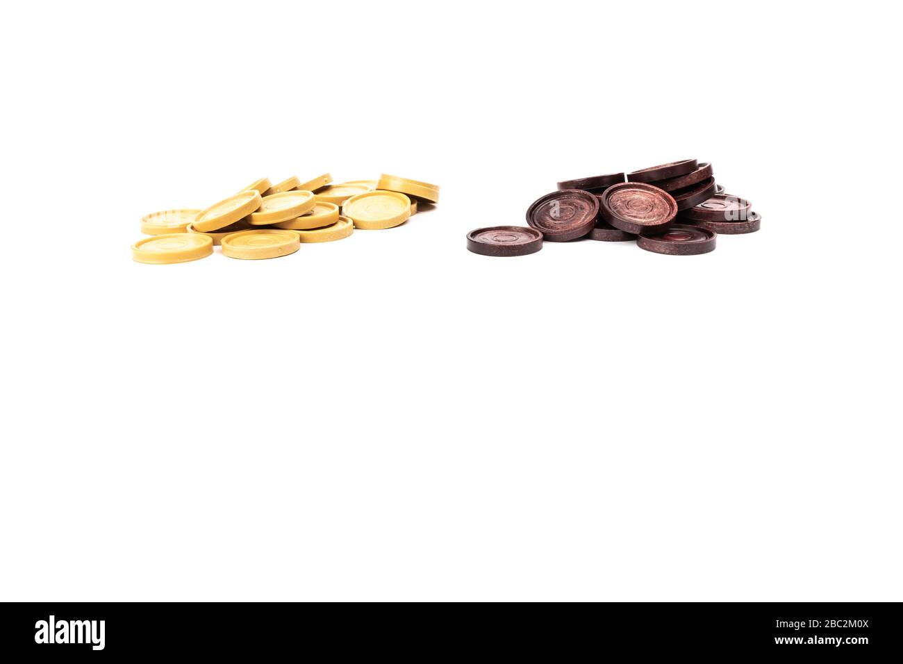 low-end plastic round checkers piece in white background in studio ...