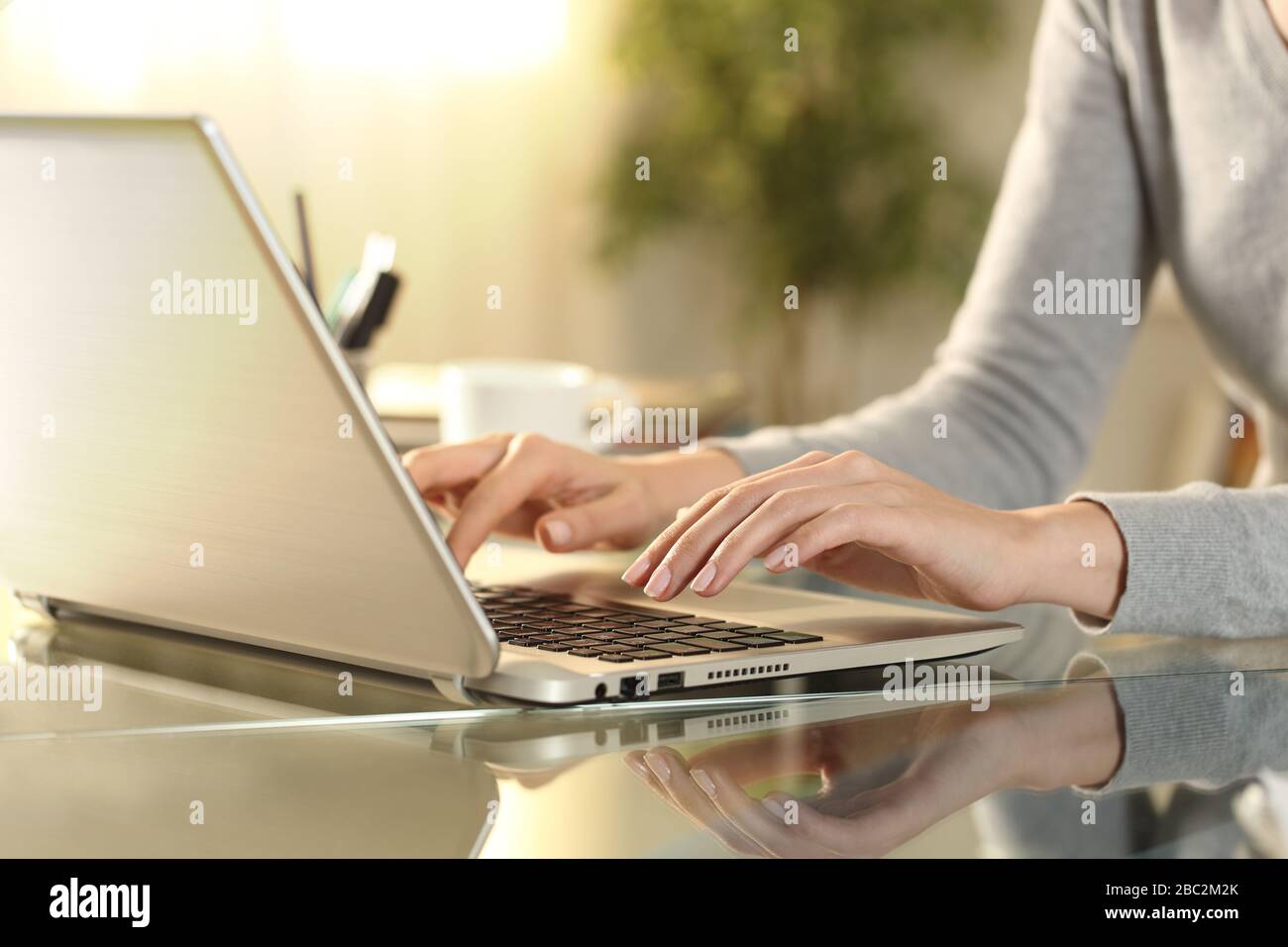 Teen girl laptop typing hi-res stock photography and images - Alamy
