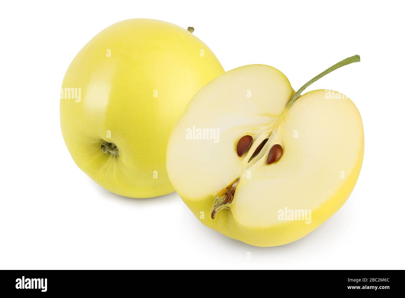 yellow apple half isolated on white background with clipping path and ...