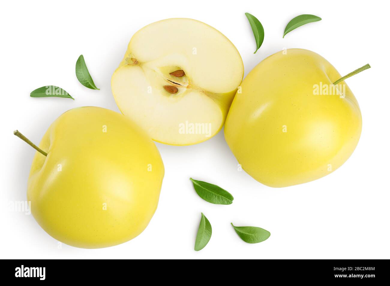 yellow apple with half isolated on white background with clipping path ...