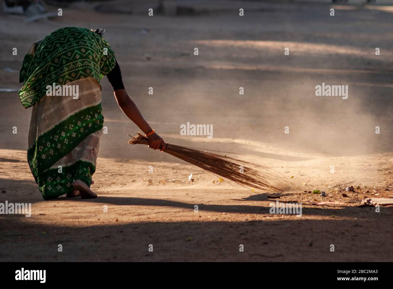 Lady sweeper hi-res stock photography and images - Alamy