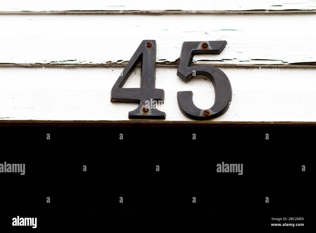 House number 45 in stark contrast Stock Photo - Alamy