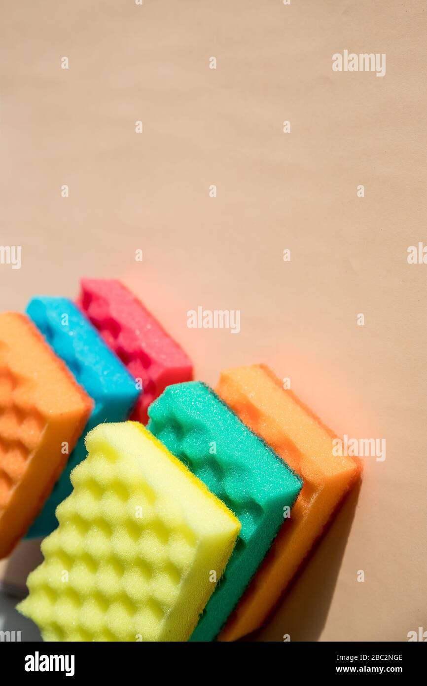 Multi-colored foam rubber sponge for cleaning and washing dishes on a ...