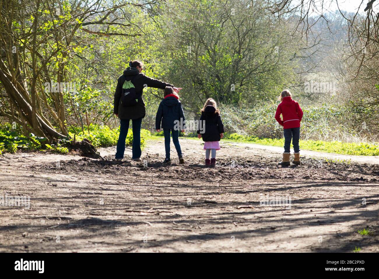 Kids walking in mud hi-res stock photography and images - Alamy