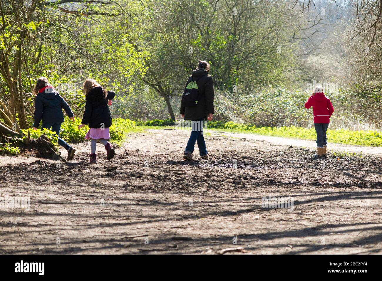 Kids walking in mud hi-res stock photography and images - Alamy