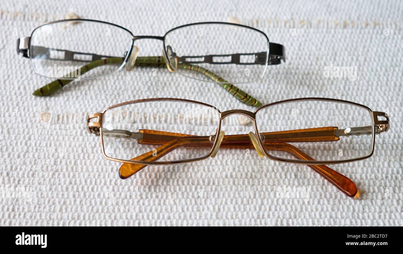 Two pairs of glasses for vision Stock Photo - Alamy
