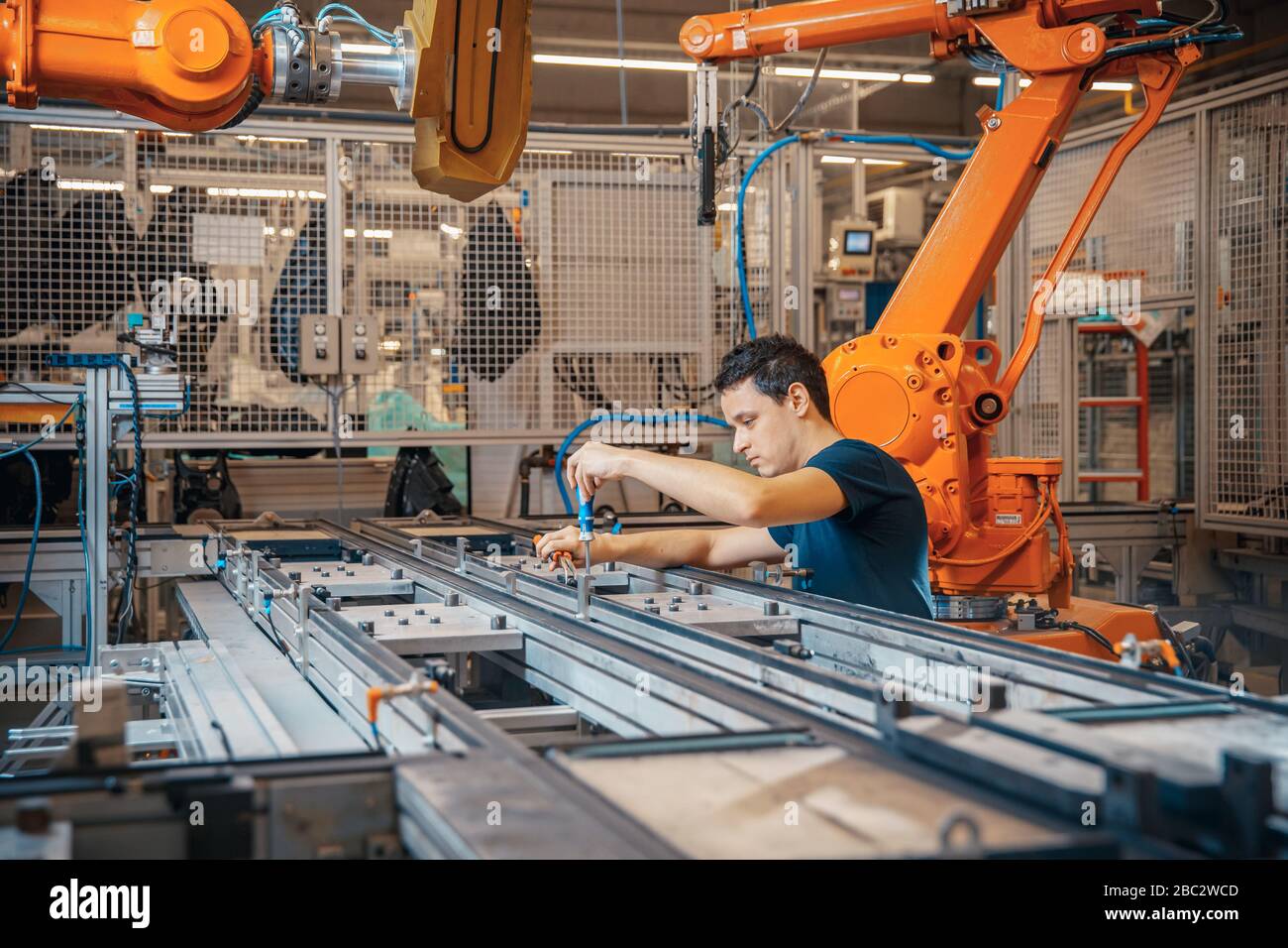 installation of new robot arms in the factory for modernization of ...