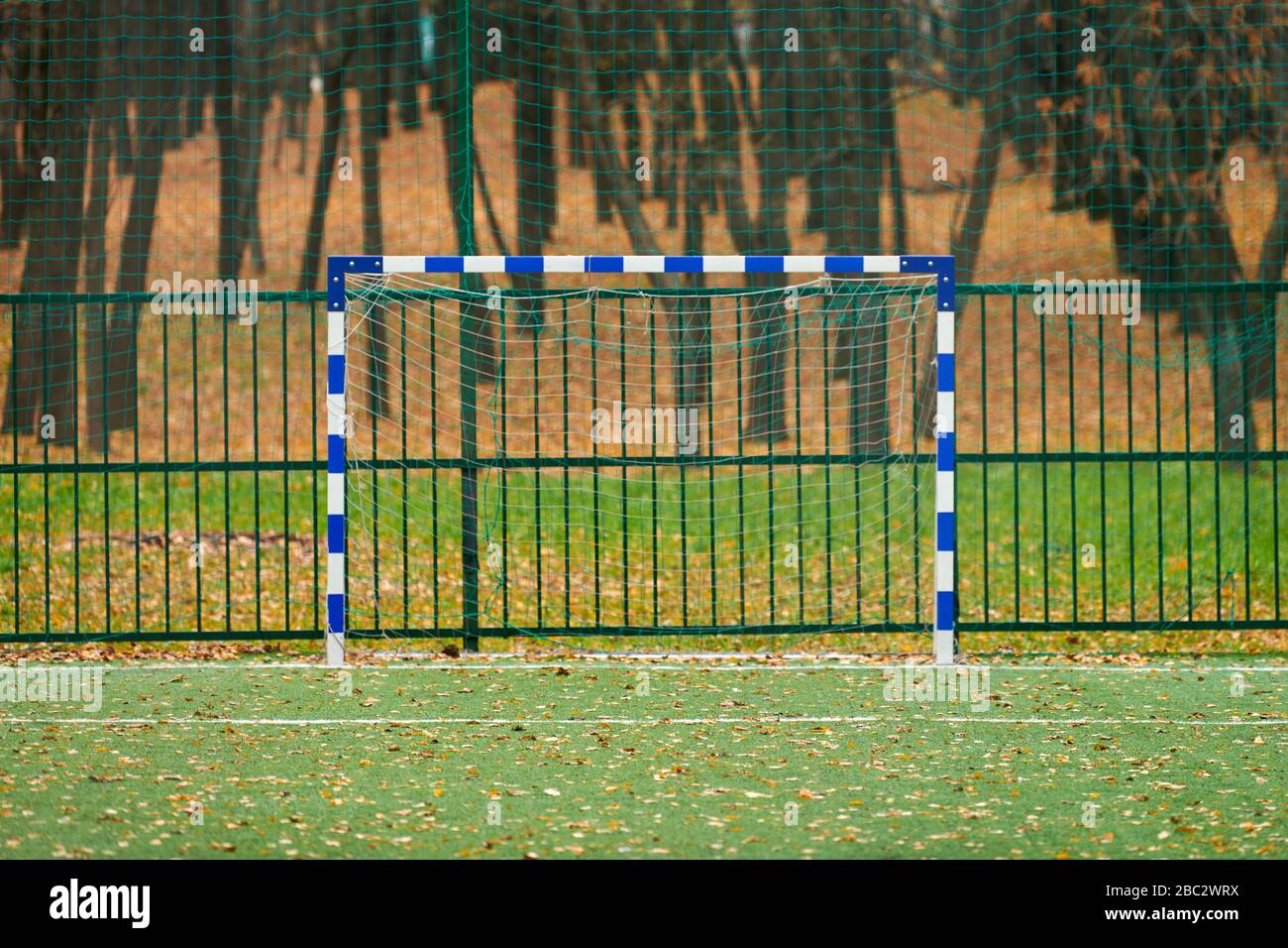 Artificial grass, sport field cover with soccer goal. Artificial turf ...
