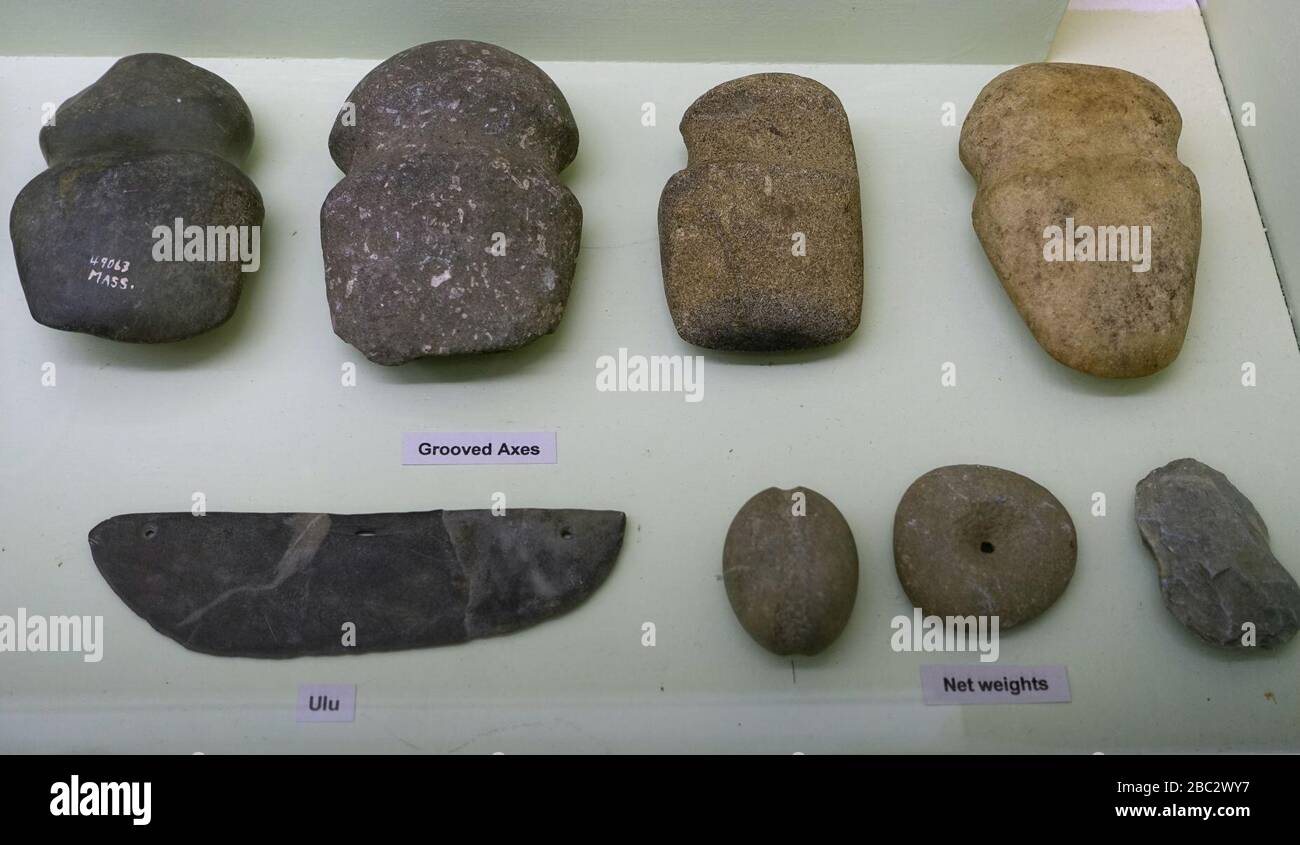 Grooved axes, ulu, and net weights - Middle Archaic Stock Photo - Alamy